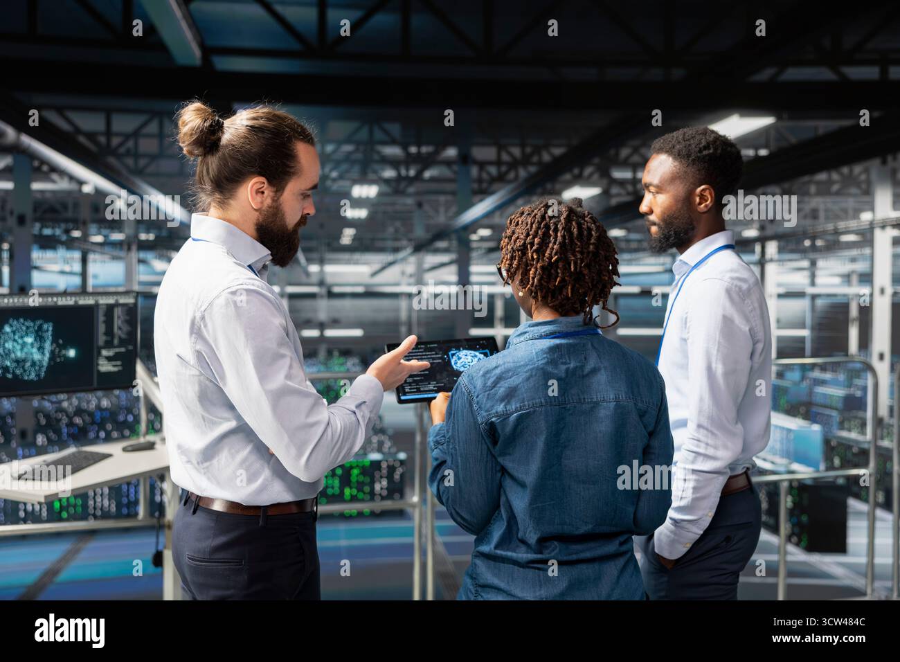 African american professionals handling performance metrics on tablet ...