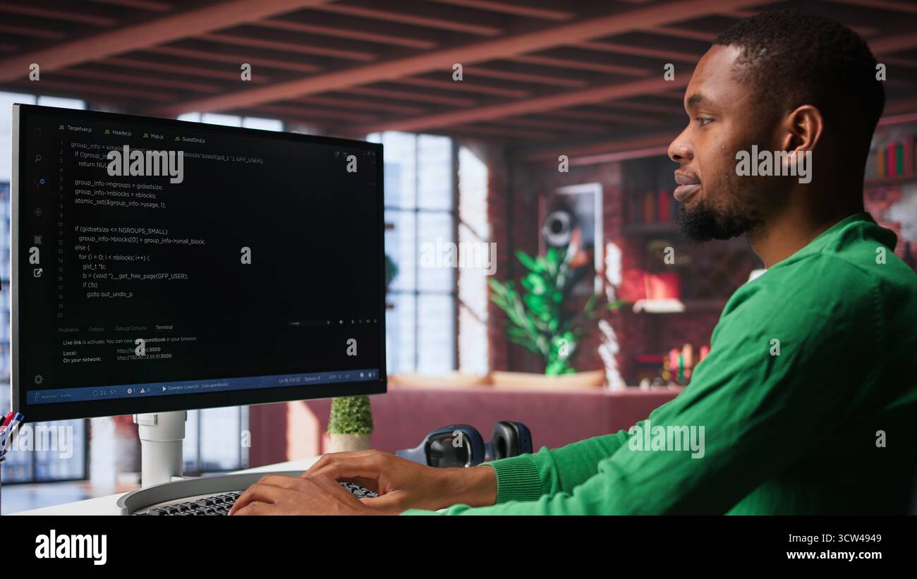 Male programmer types code hi-res stock photography and images - Alamy