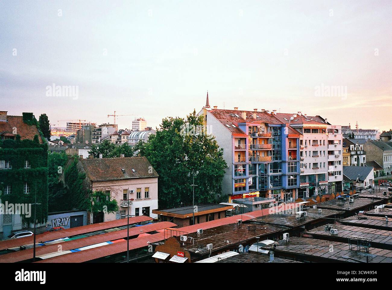 New building rising in the old city core of Novi Sad, creating a strong ...