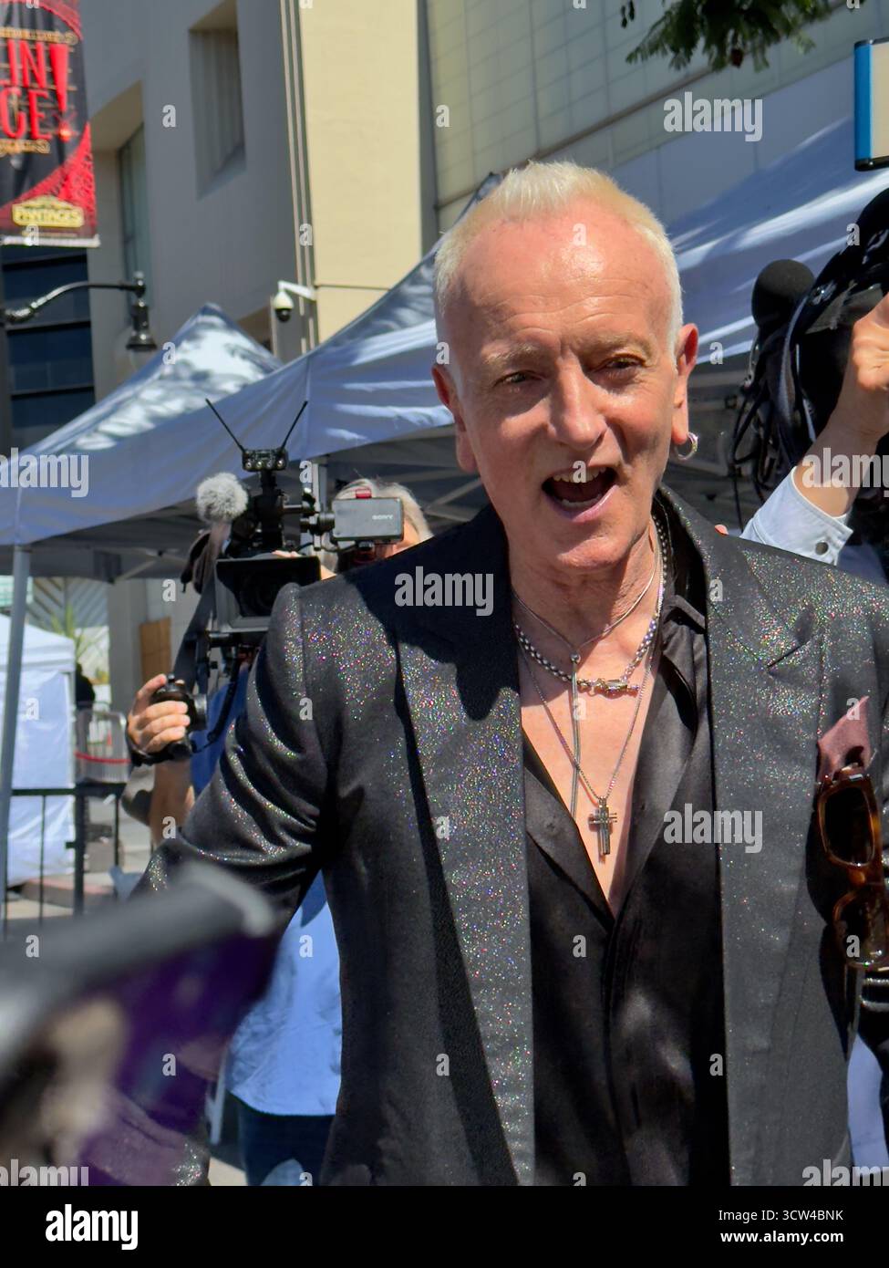 Phil Collen greets fans during Def Leppard’s Hollywood Walk of Fame ...