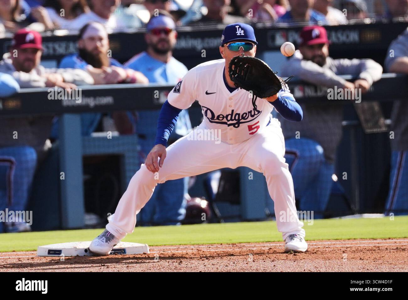 Los Angeles Dodgers first baseman Freddie Freeman catches a throw to ...