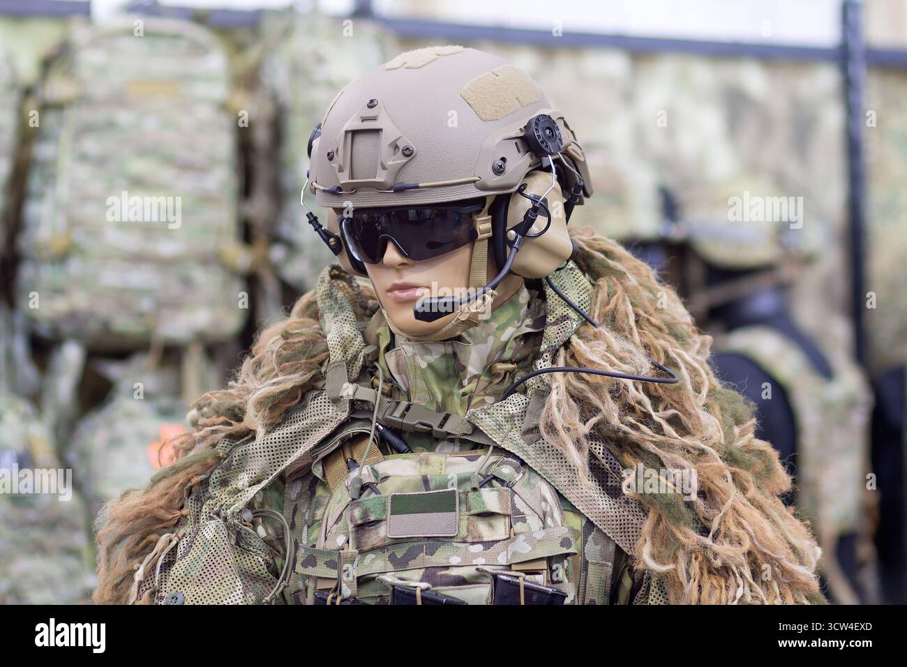 Mannequins in military uniform and tactical helmet, goggles, and ...