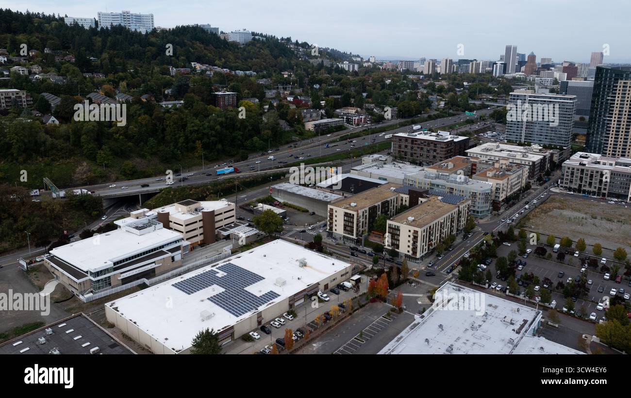 With downtown Portland, Ore., in the distance, a U.S. Immigration and ...