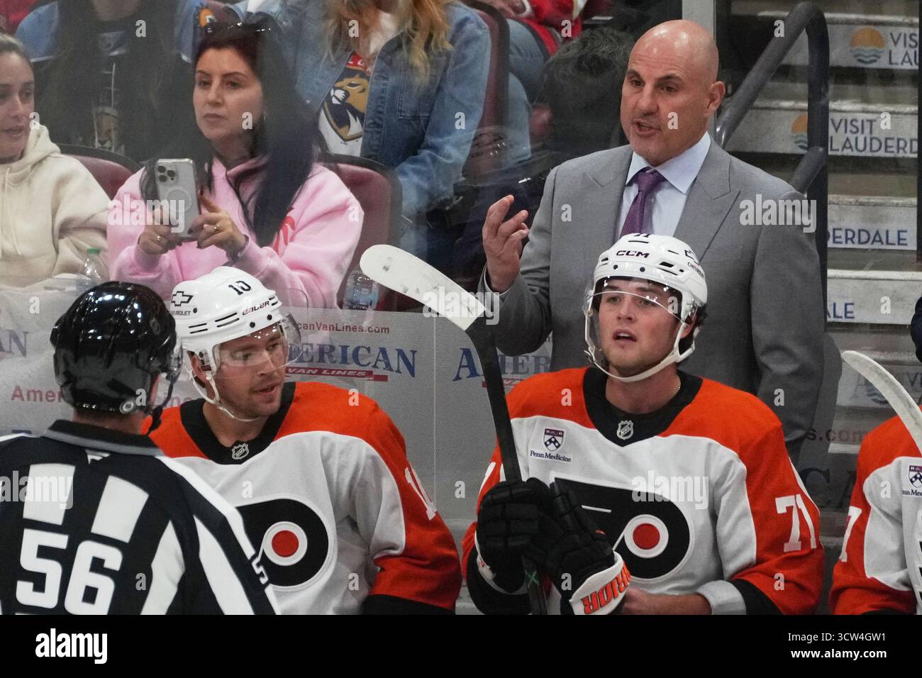 Philadelphia Flyers head coach Rick Tocchet gestures to referee Matt ...