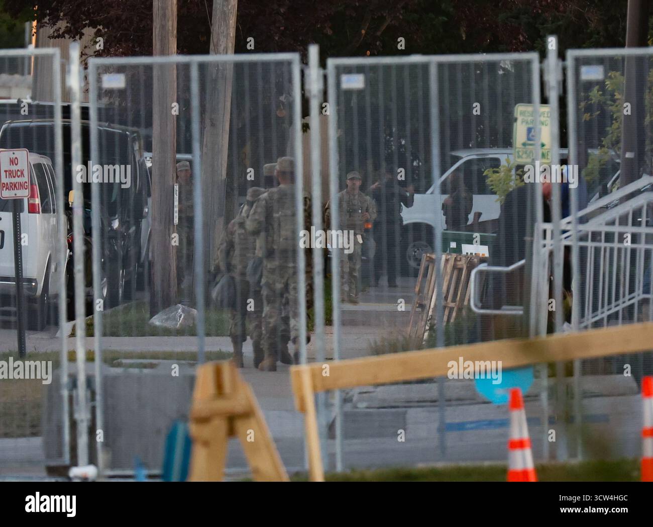 Members of the Texas National Guard stand outside the Immigration and ...