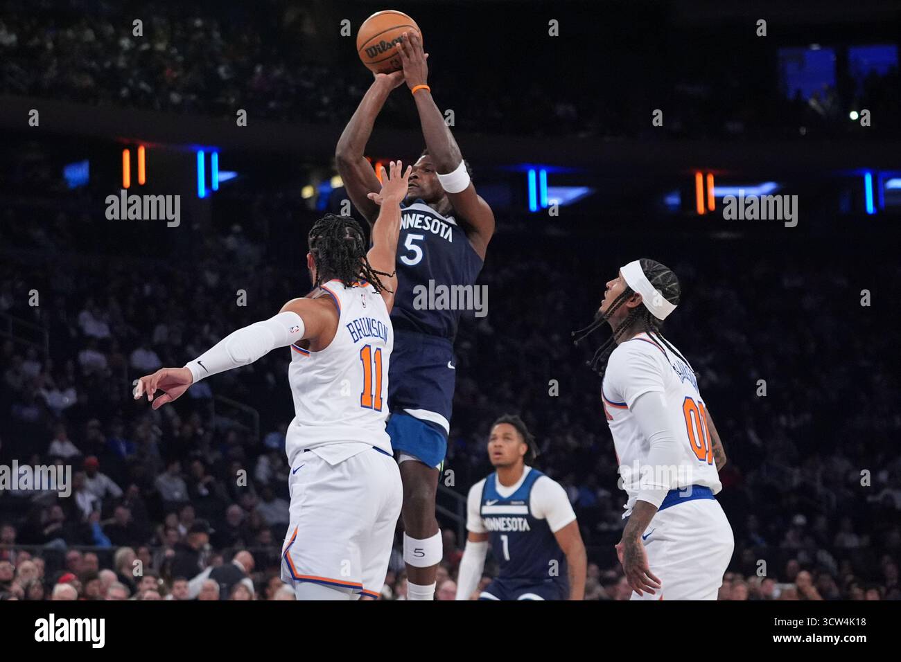 Minnesota Timberwolves' Anthony Edwards (5) shoots over New York Knicks ...