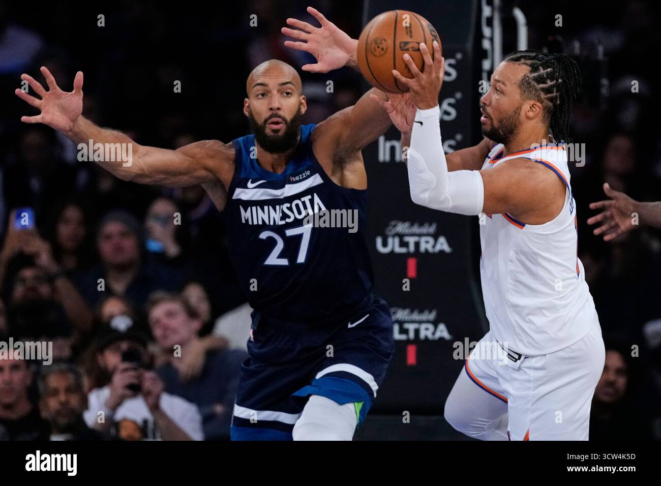 New York Knicks' Jalen Brunson, right, passes away from Minnesota ...