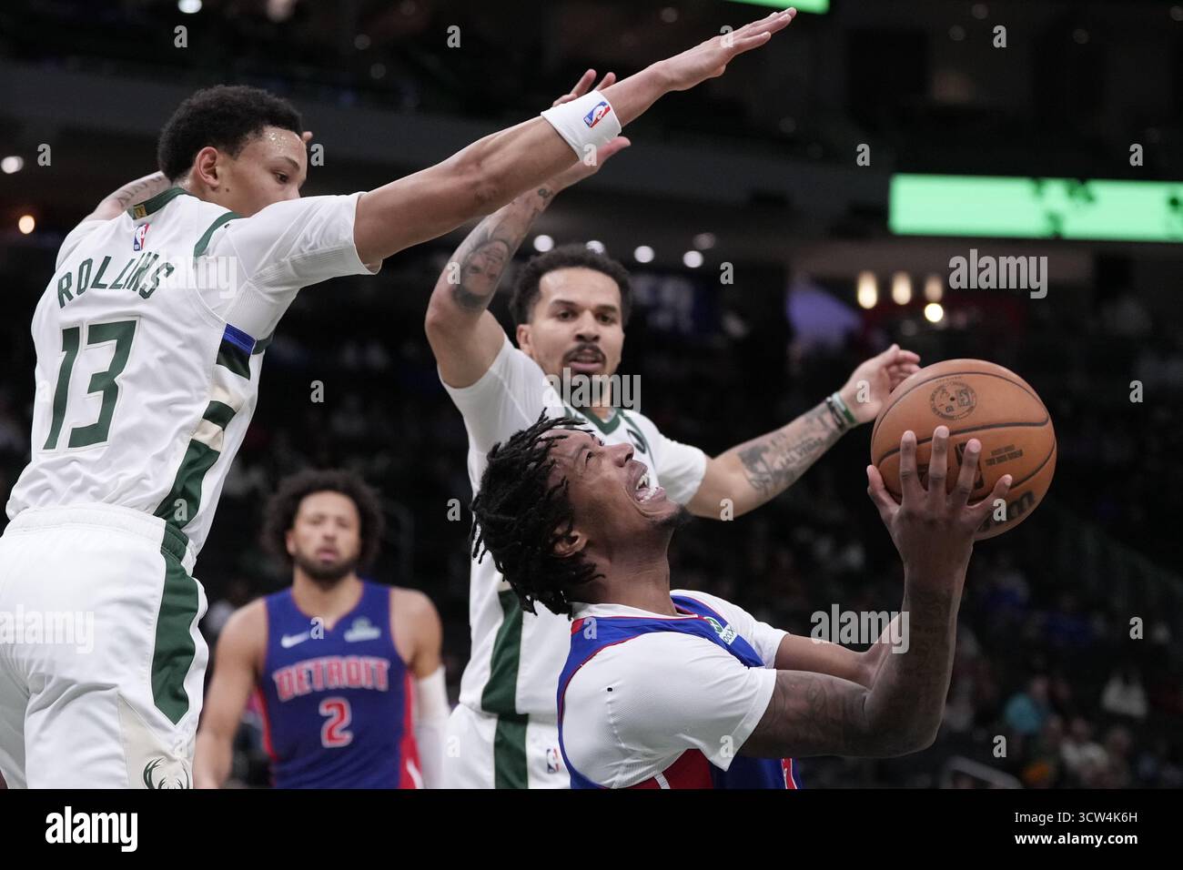 Detroit Pistons' Ronald Holland II shoots past Milwaukee Bucks' Ryan ...