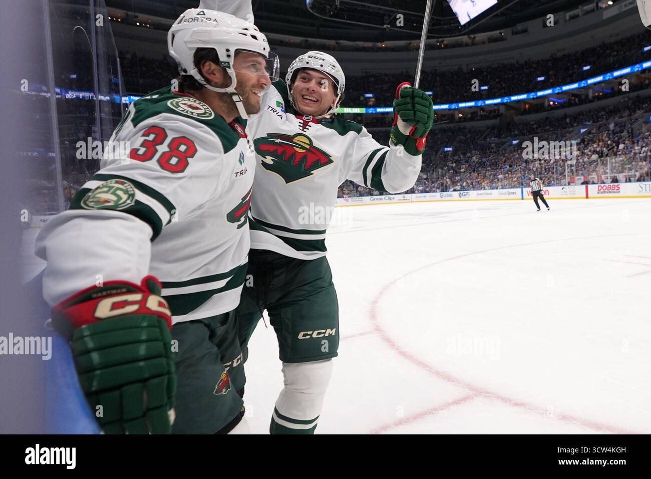 Minnesota Wild's Ryan Hartman (38) is congratulated by teammate Brock ...