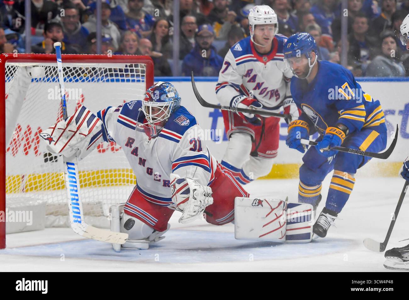 New York Rangers goalie Igor Shesterkin (31) reaches for a loose puck ...