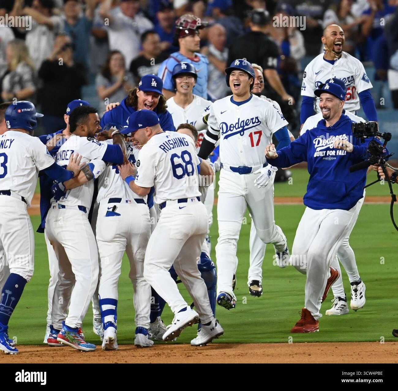 Los Angeles Dodgers' designated hitter Shohei Ohtani (C, 17) and his ...