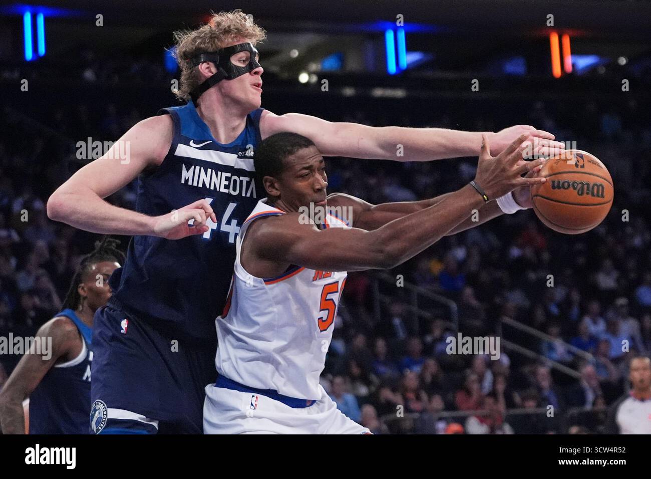 Minnesota Timberwolves' Rocco Zikarsky (44) defends New York Knicks ...