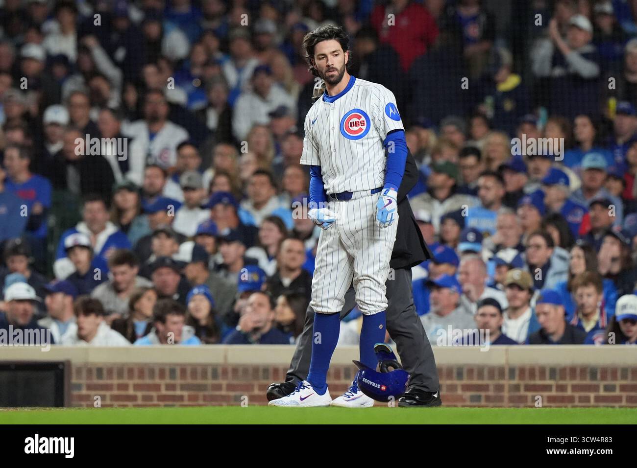 Chicago Cubs' Dansby Swanson (7) reacts after striking out to end the ...