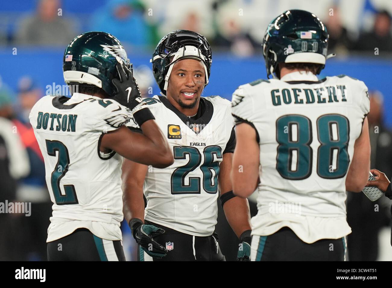 Philadelphia Eagles' Saquon Barkley, center, Jahan Dotson and Dallas ...