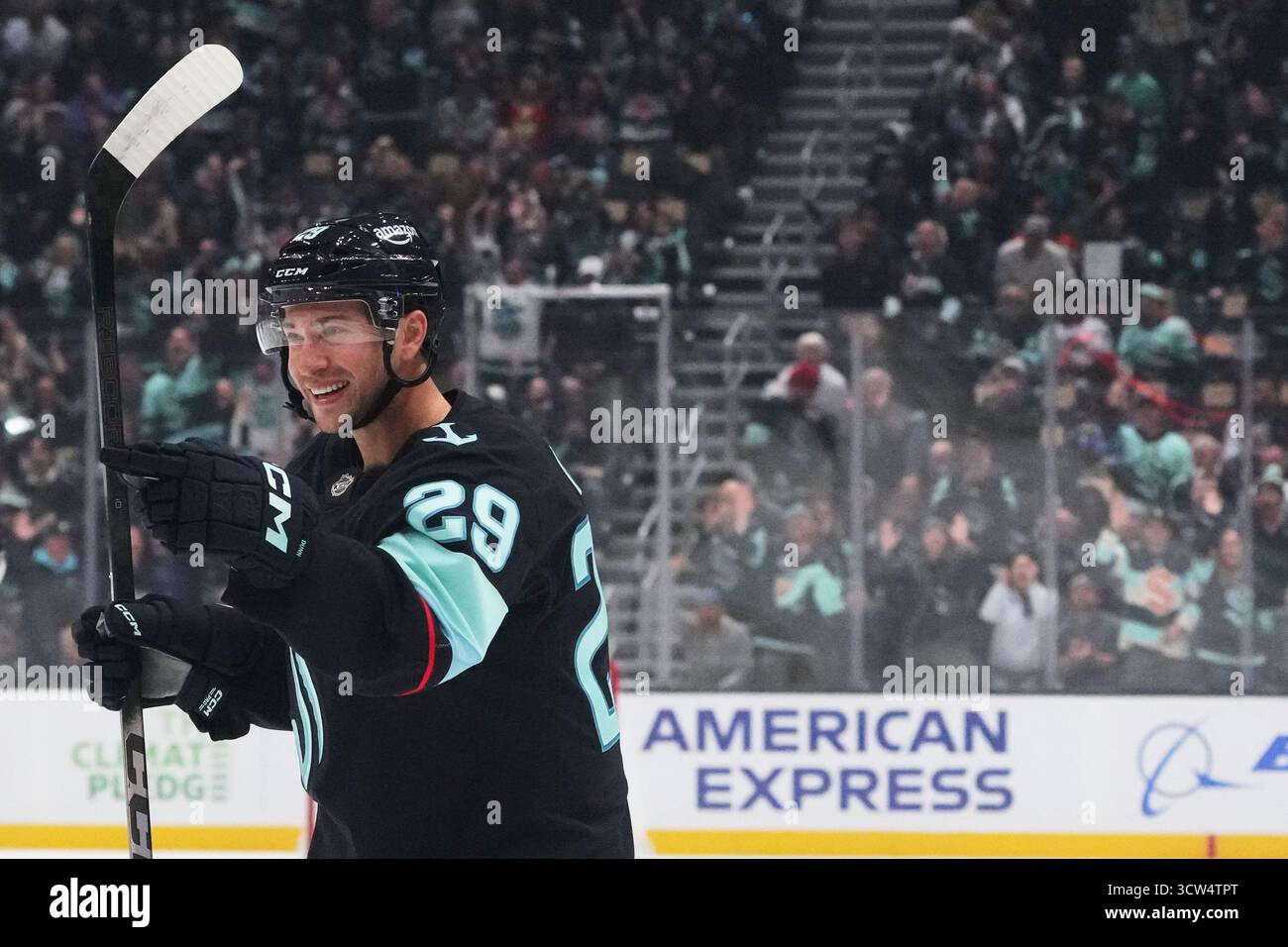 Seattle Kraken defenseman Vince Dunn reacts after scoring against the ...