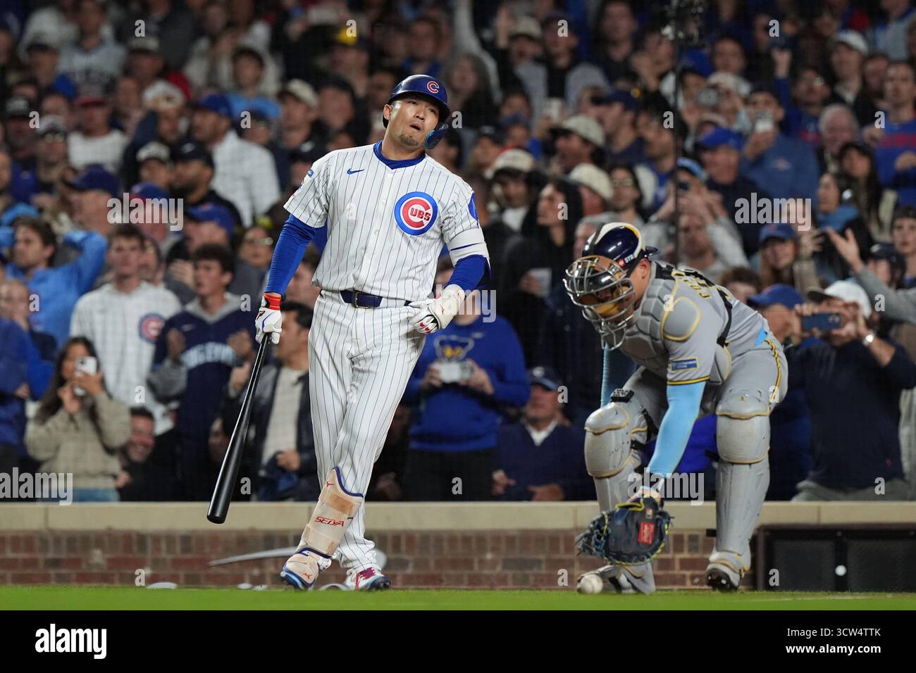 Chicago Cubs' Seiya Suzuki (27) reacts after striking out during the ...