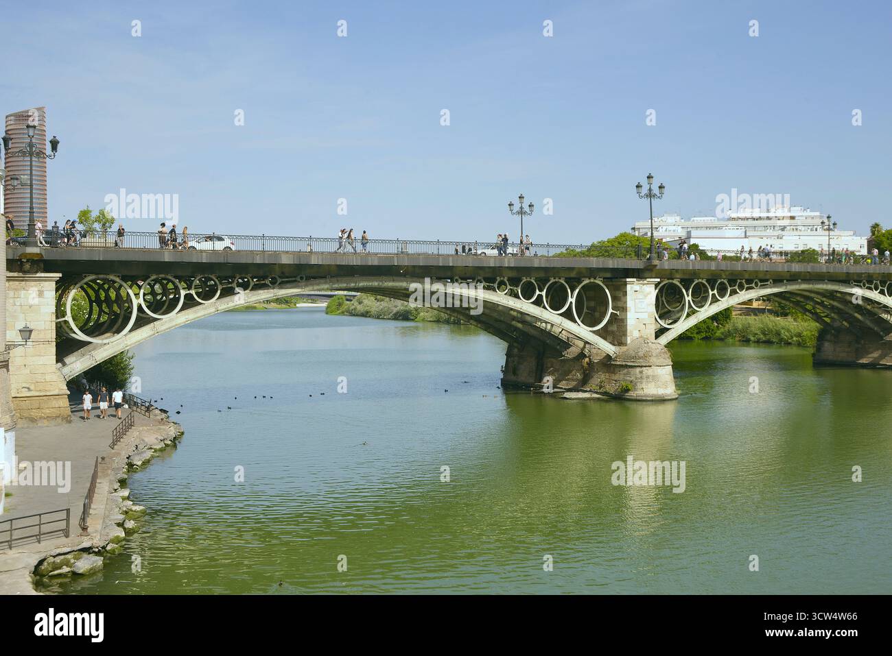 The Triana Bridge next to the Guadalquivir River in the city of Seville ...