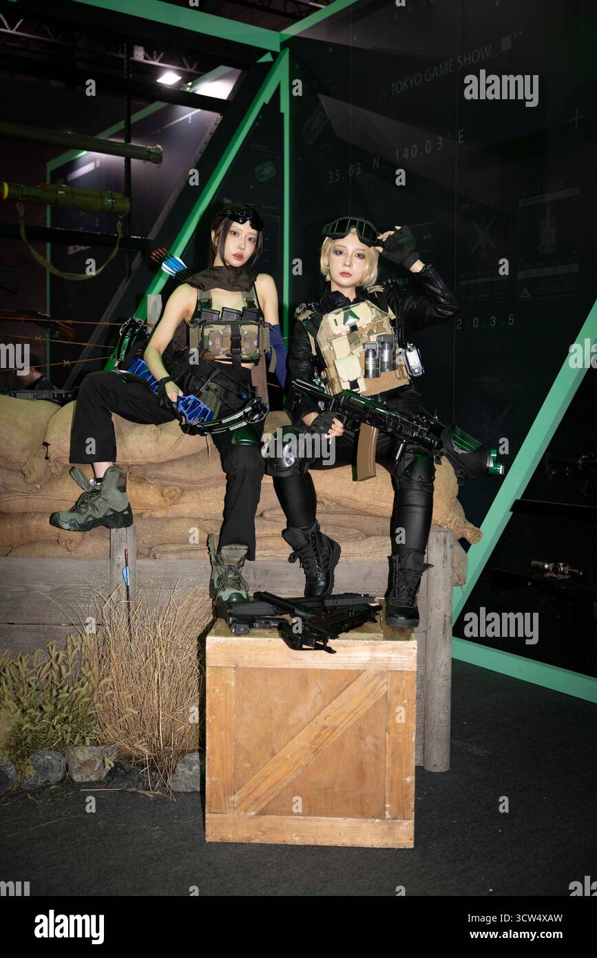 Chiba, Japan. 26th Sep, 2025. Cosplayers advertise the cross-platform ...