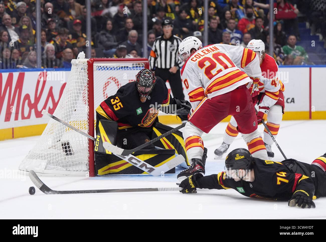 Vancouver Canucks goalie Thatcher Demko (35) watches as teammate Jake ...