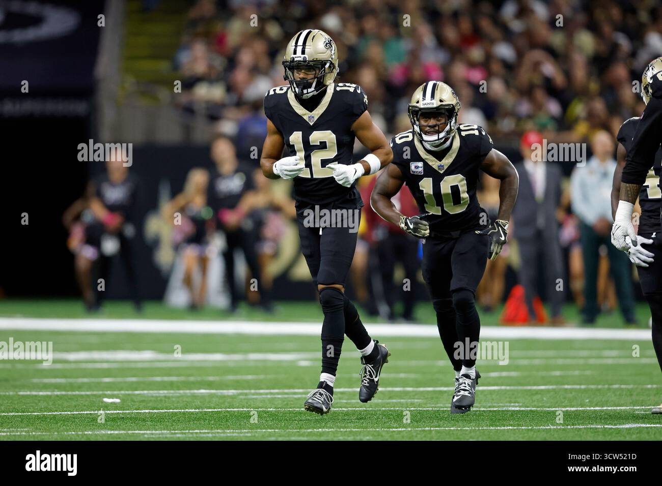 New Orleans Saints wide receiver Chris Olave (12) and wide receiver ...