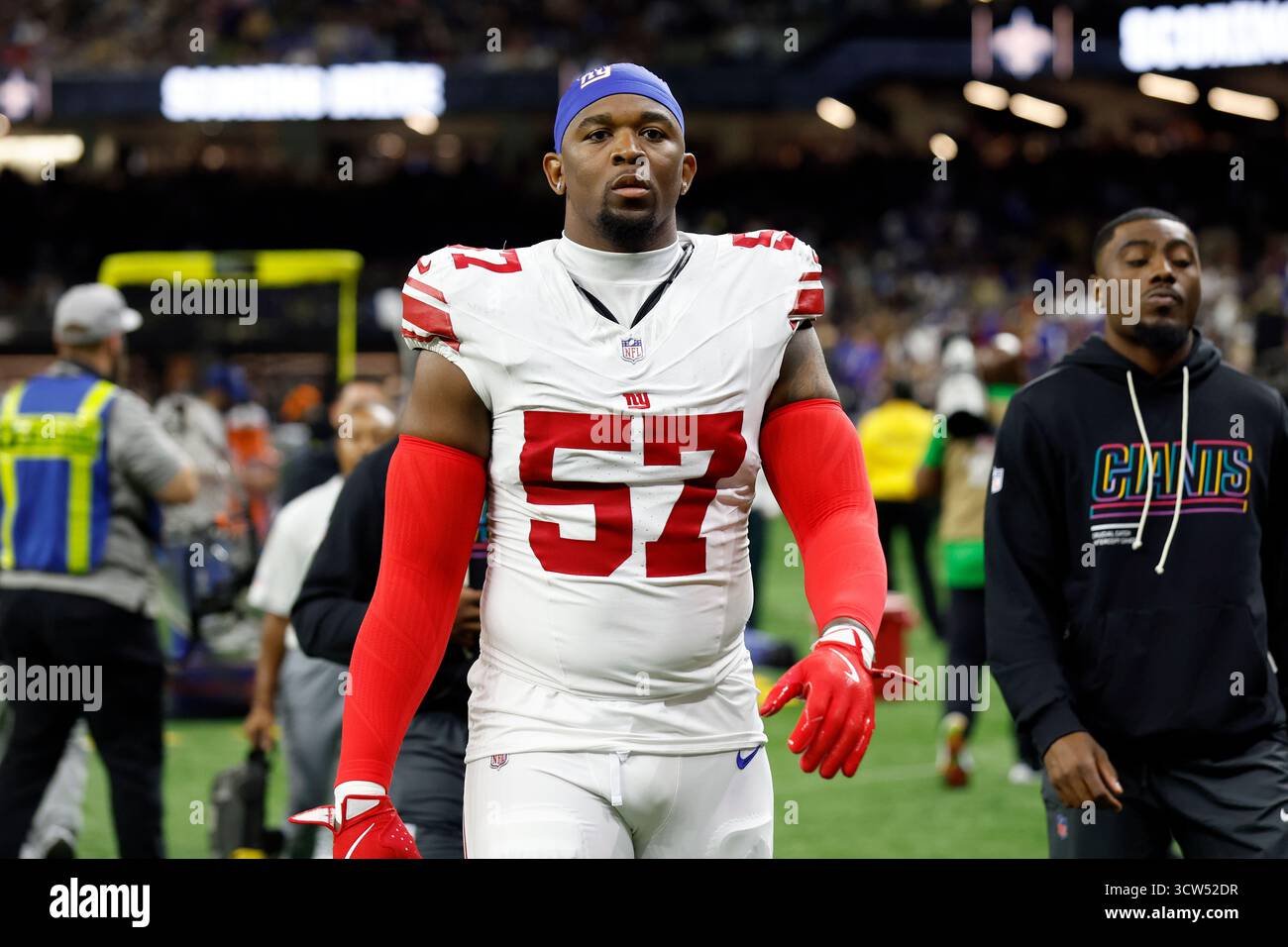 New York Giants defensive end Chauncey Golston (57) exits the field ...