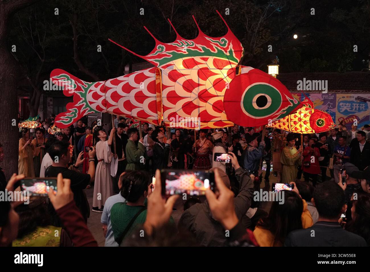 **CHINESE MAINLAND, HONG KONG, MACAU AND TAIWAN OUT** Fish lanterns ...