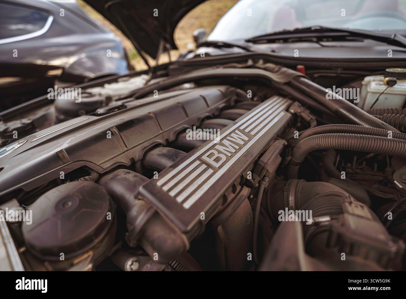Rome, italy 10 september 2025: bmw engine bay with open hood revealing ...