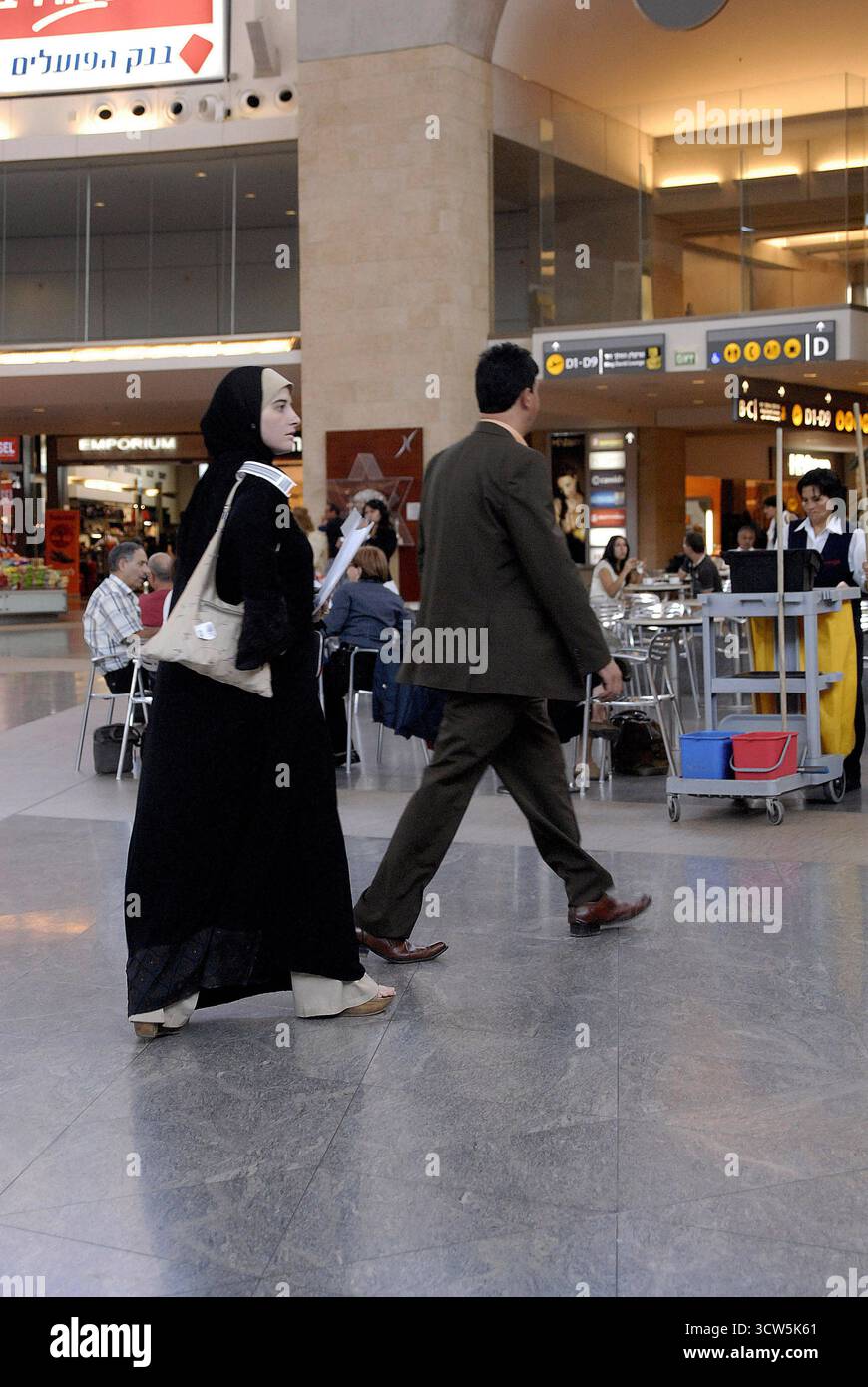 People at working on laptop while waiting for interntional flights at ...