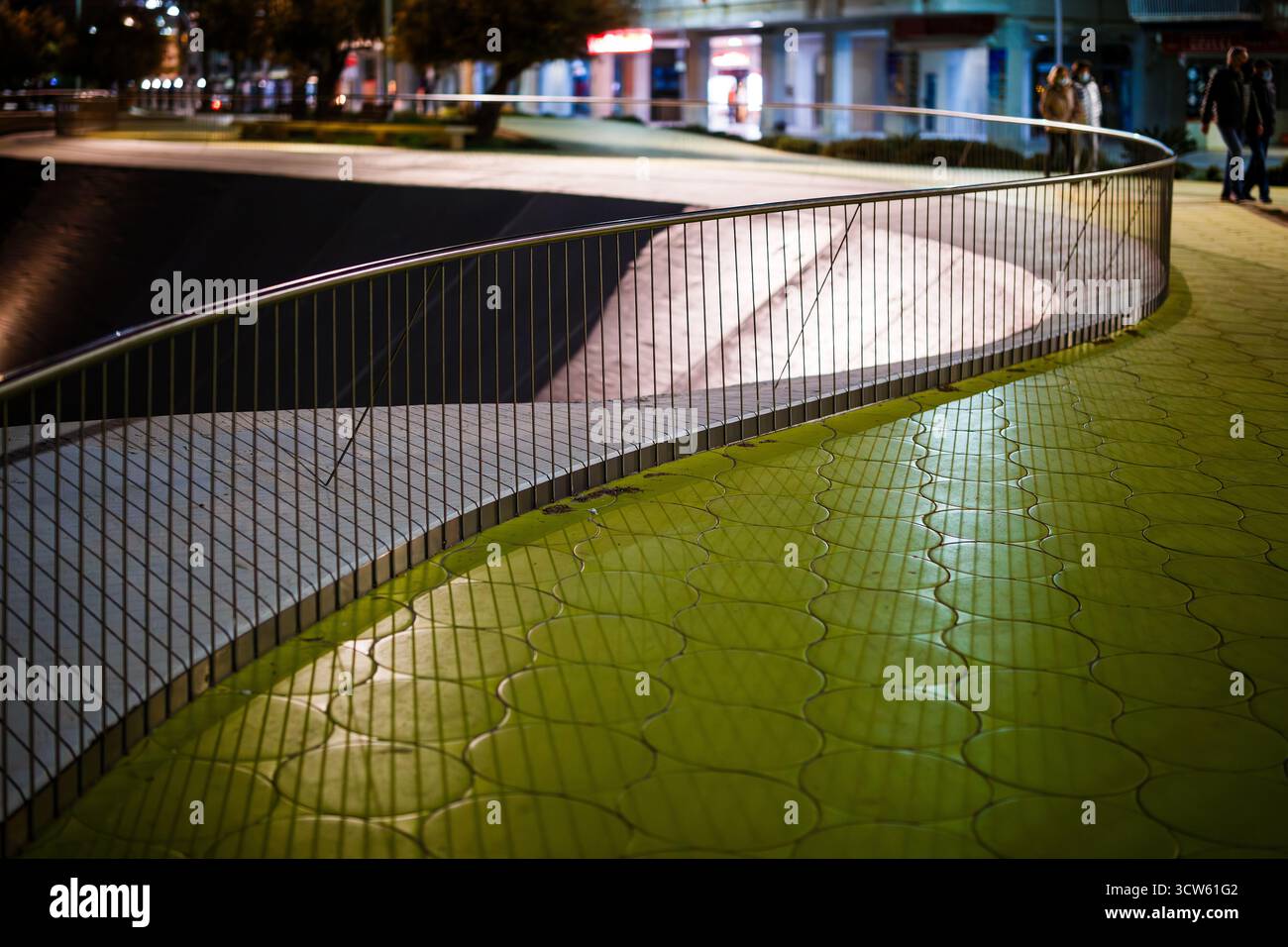 Modern Promenade Walkway with Curved Railing Stock Photo - Alamy