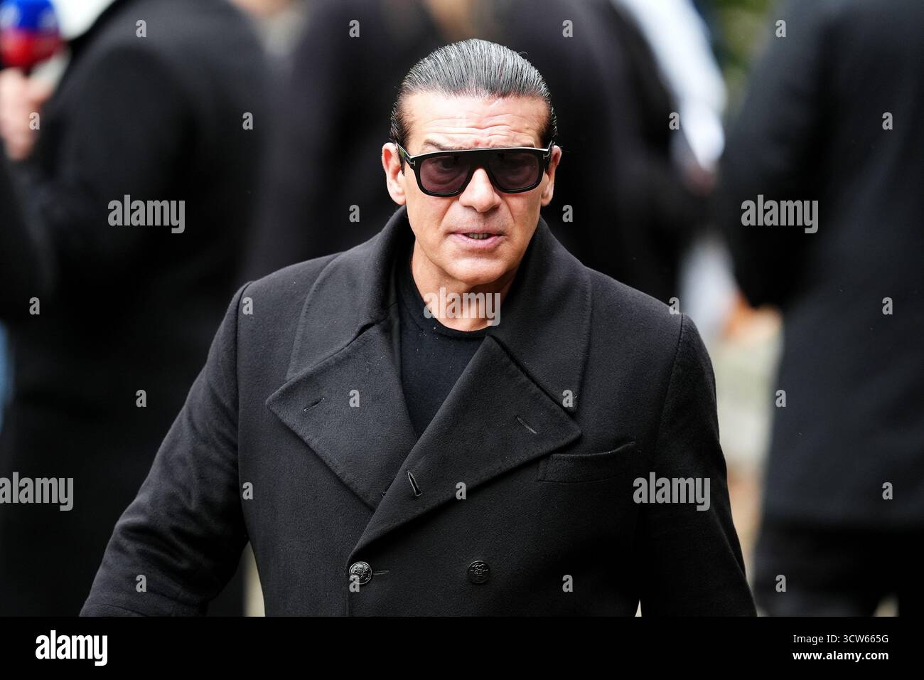 Actor Tamer Hassan arrives ahead of the funeral service for Ricky ...