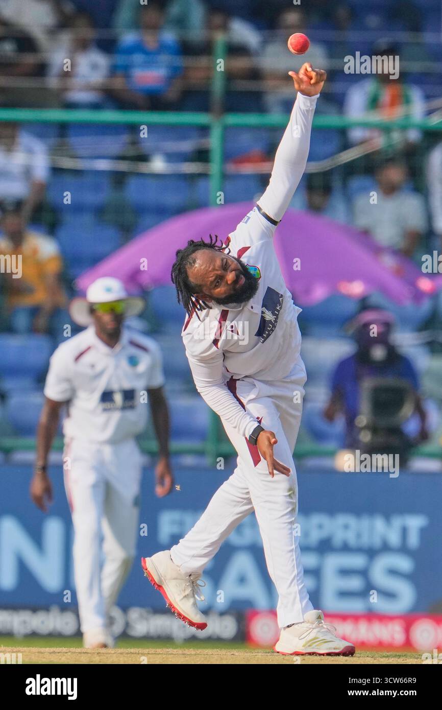 West Indies' Jomel Warrican bowls a delivery on the first day of the ...