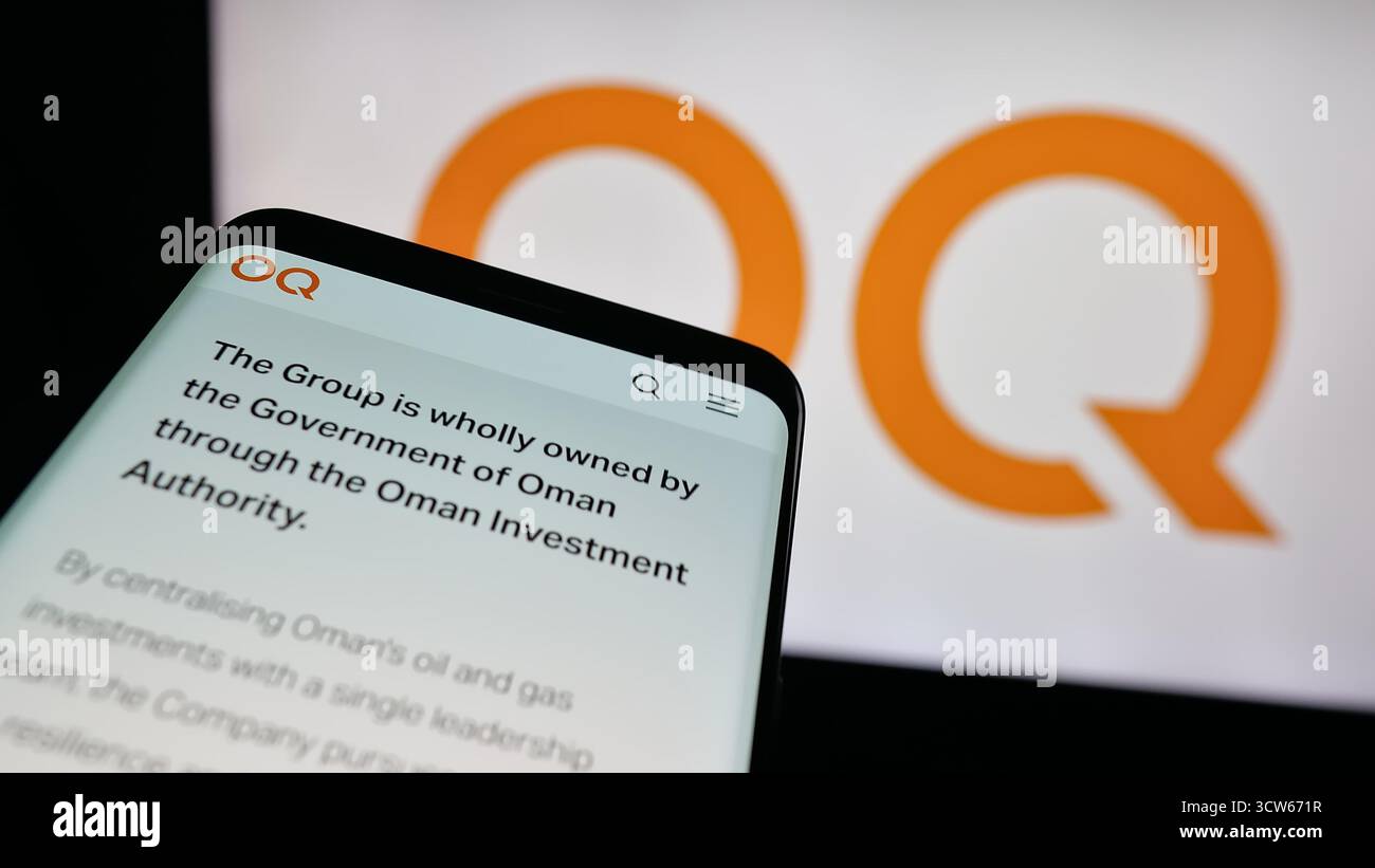 In this photo illustration, a mobile phone with the website of Omani ...