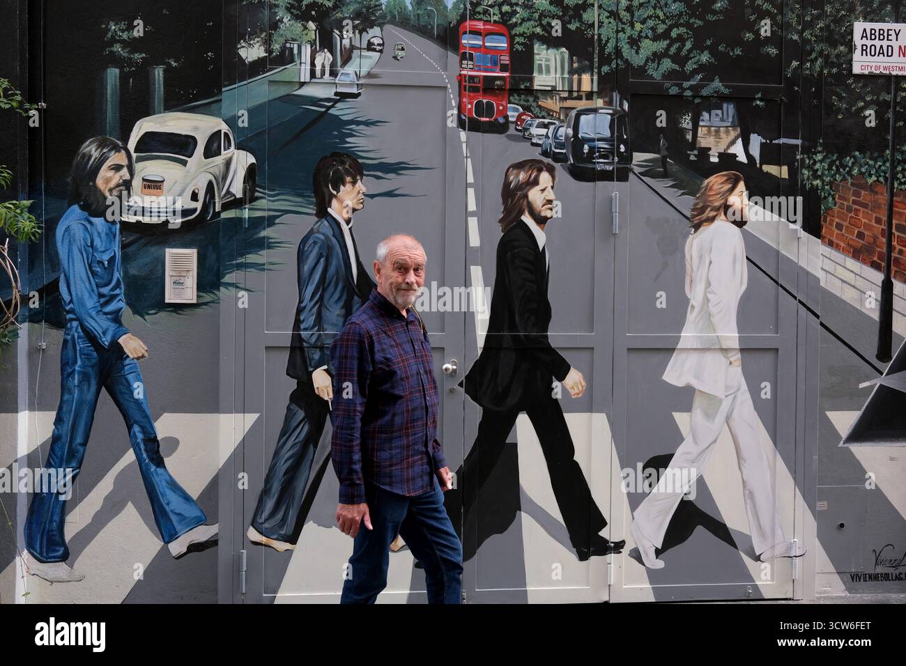 Street art mural Wall of Fame The Beatles mural of the band in Abbey ...