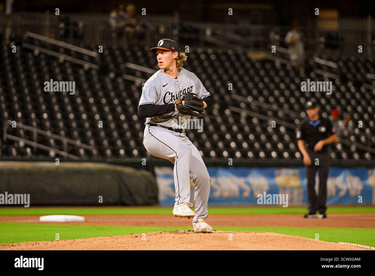 Glendale Desert Dogs pitcher Hagen Smith (33) throws against the ...