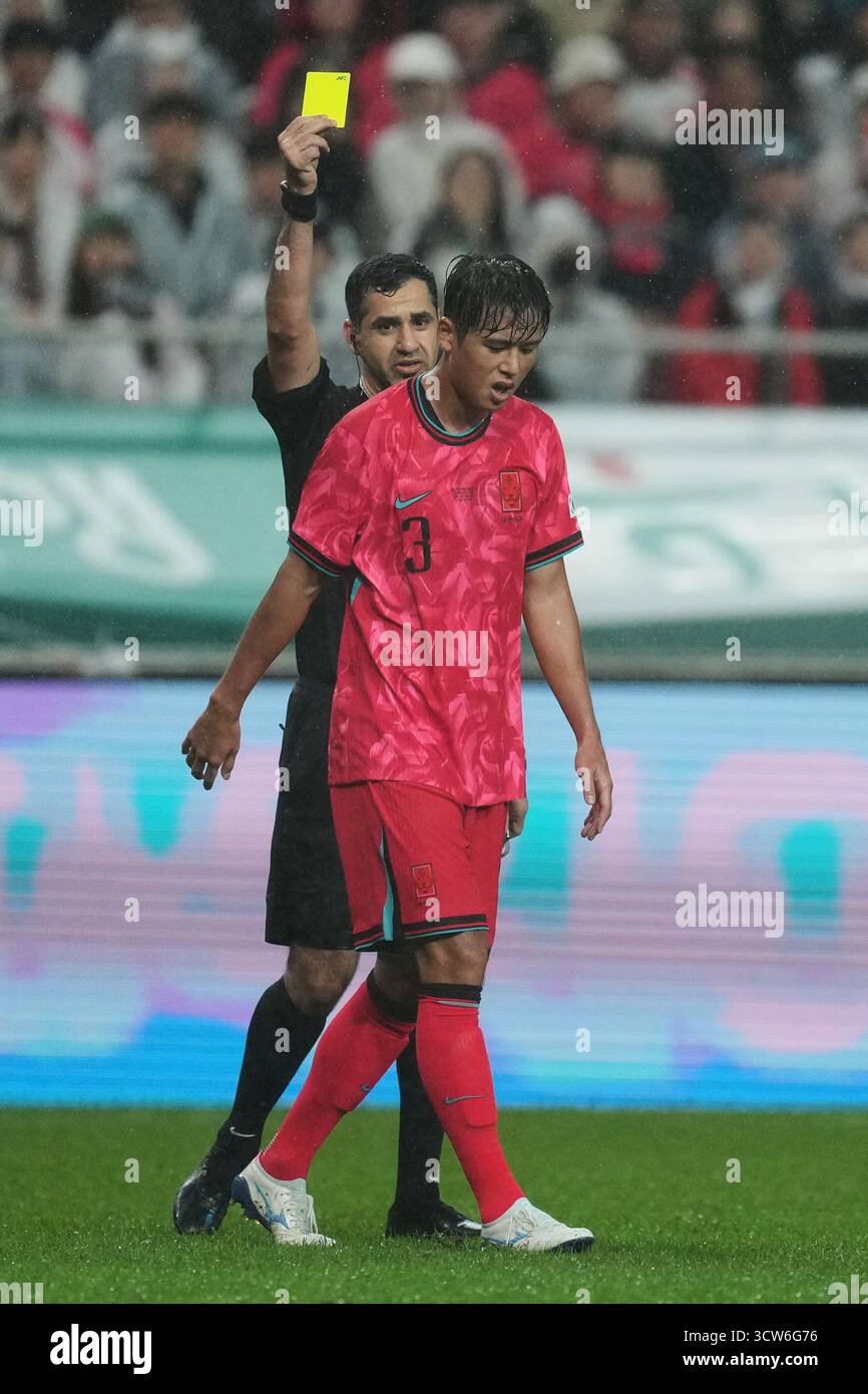 South Korea's Kim Ju-sung receives yellow card during the international ...