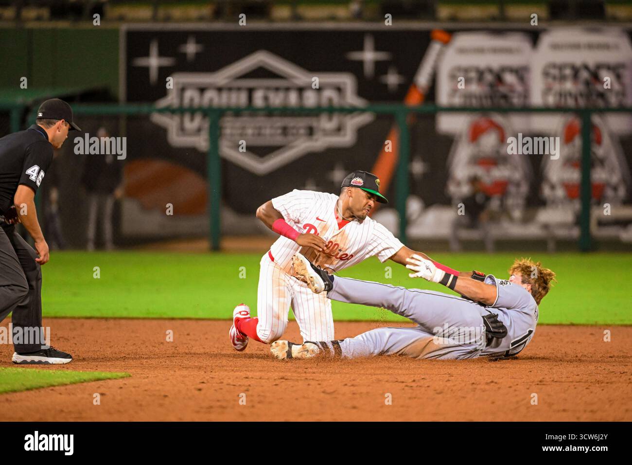 Surprise Saguaros second baseman Dylan Campbell (10) tags out Sam ...