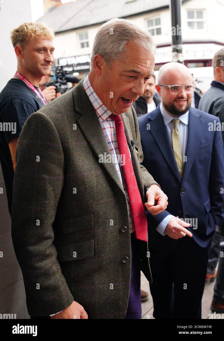 Reform UK leader Nigel Farage campaigning in Caerphilly, South Wales ...