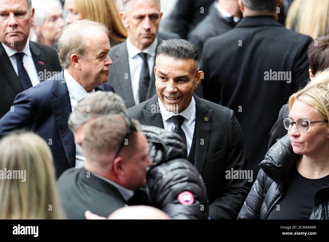 Former boxer Robin Reid arrives ahead of the funeral service for Ricky ...