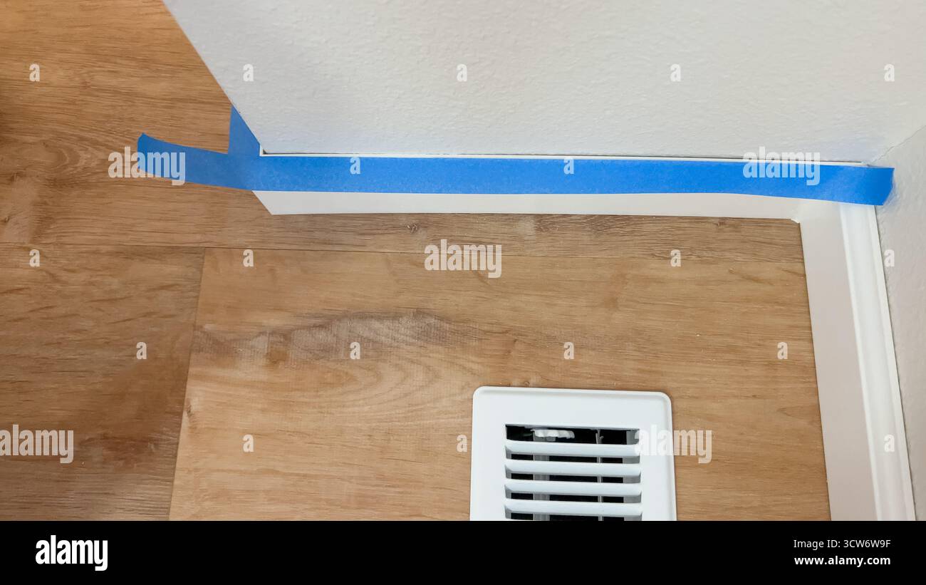 Painter tape corner setup near vent Stock Photo - Alamy