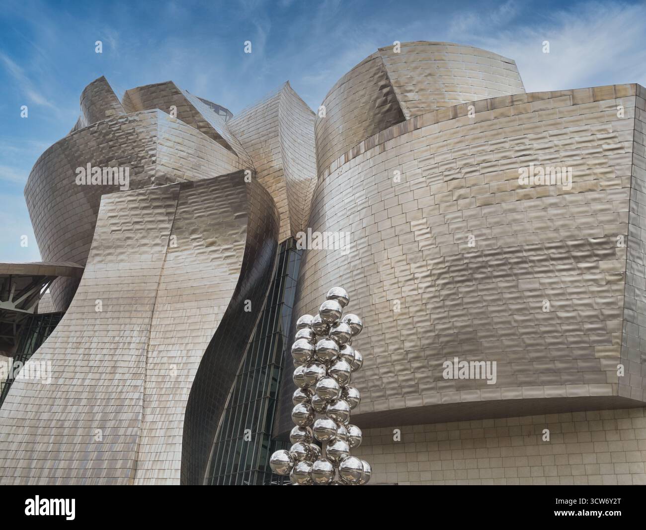 Guggenheim Museum Bilbao with Maman Spider Sculpture - Iconic view of ...