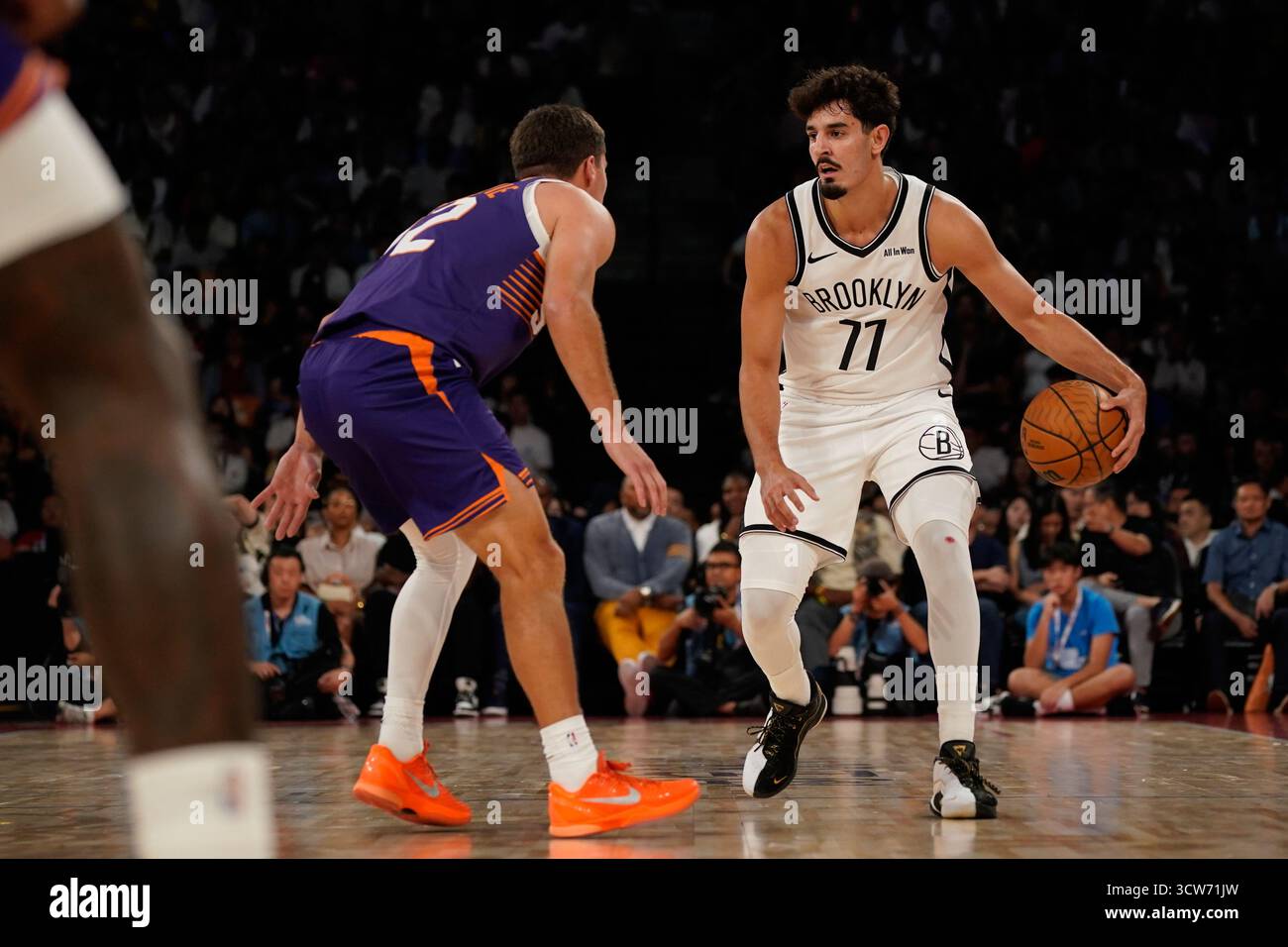 Phoenix Suns guard Collin Gillespie guards Brooklyn Nets guard Ben ...