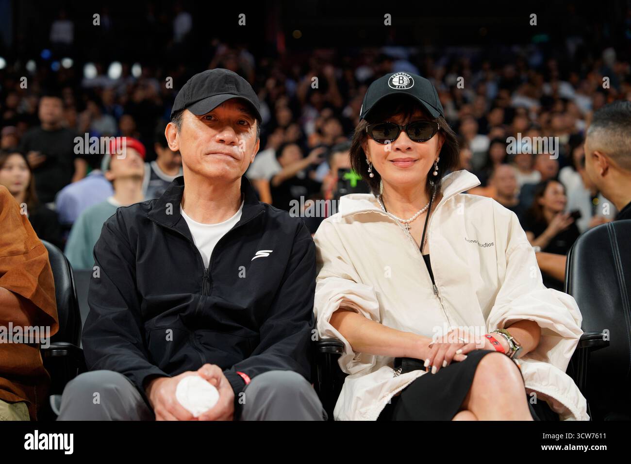 Hong Kong actors Tony Leung and his wife Carina Lau attend a preseason ...