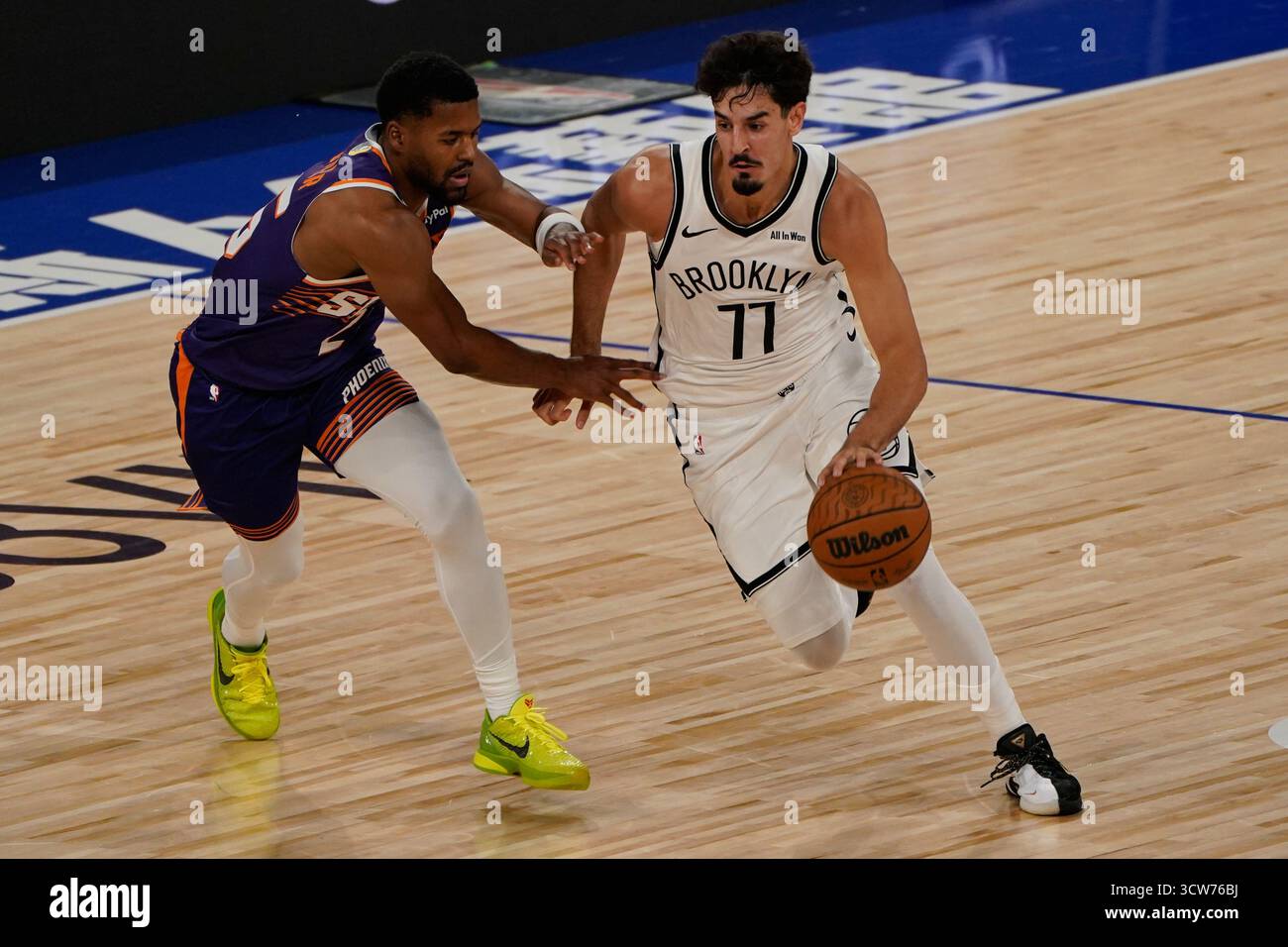 Phoenix Suns Jared Butler guards Brooklyn Nets guard Ben Saraf (77 ...