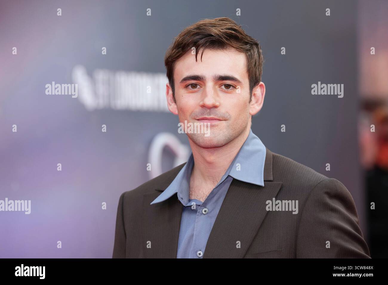 Charlie Rowe poses for photographers upon arrival at the premiere of ...