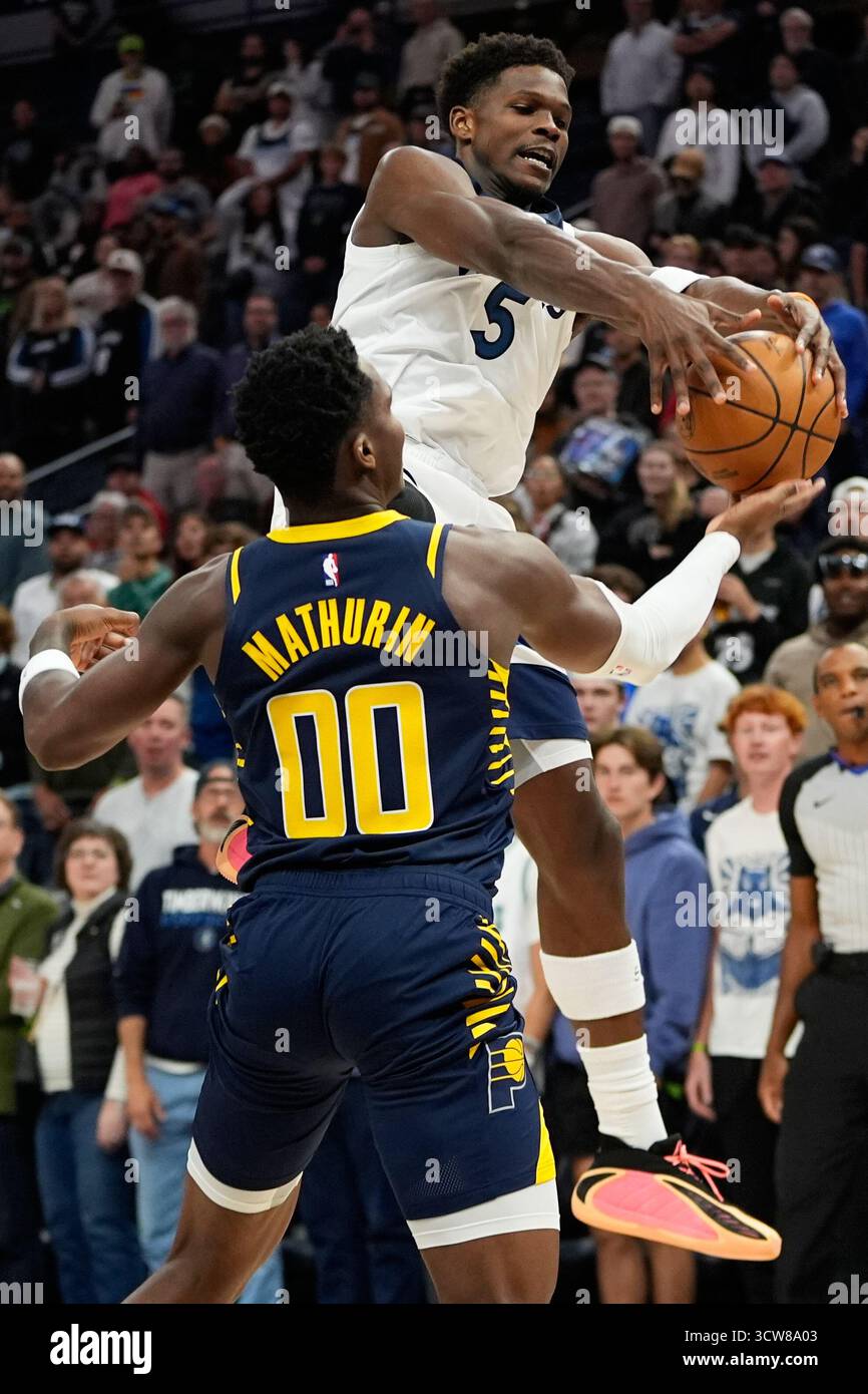 Minnesota Timberwolves guard Anthony Edwards (5) loses control of the ...