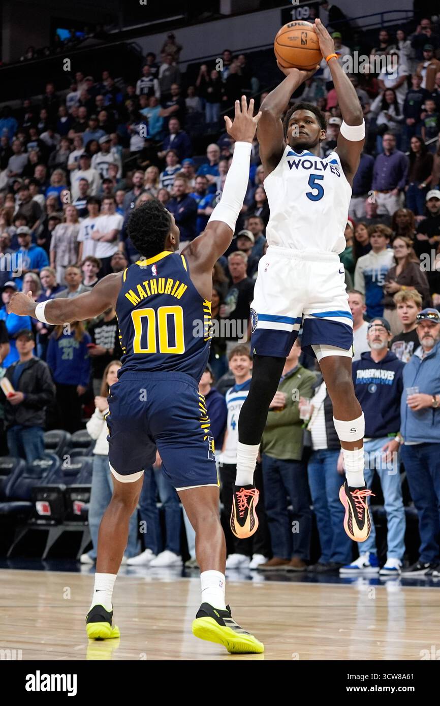 Minnesota Timberwolves guard Anthony Edwards (5) shoots over Indiana ...