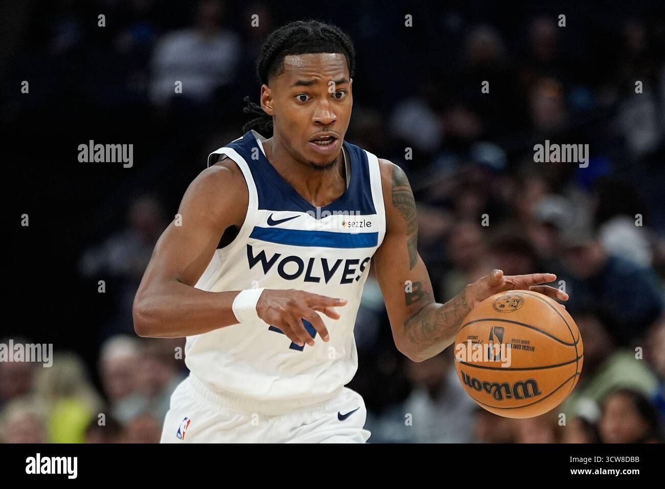 Minnesota Timberwolves guard Rob Dillingham (4) dribbles down the court ...
