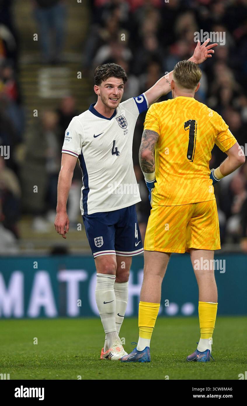 Declan Rice and Jordon Pickford of England in action during the ...