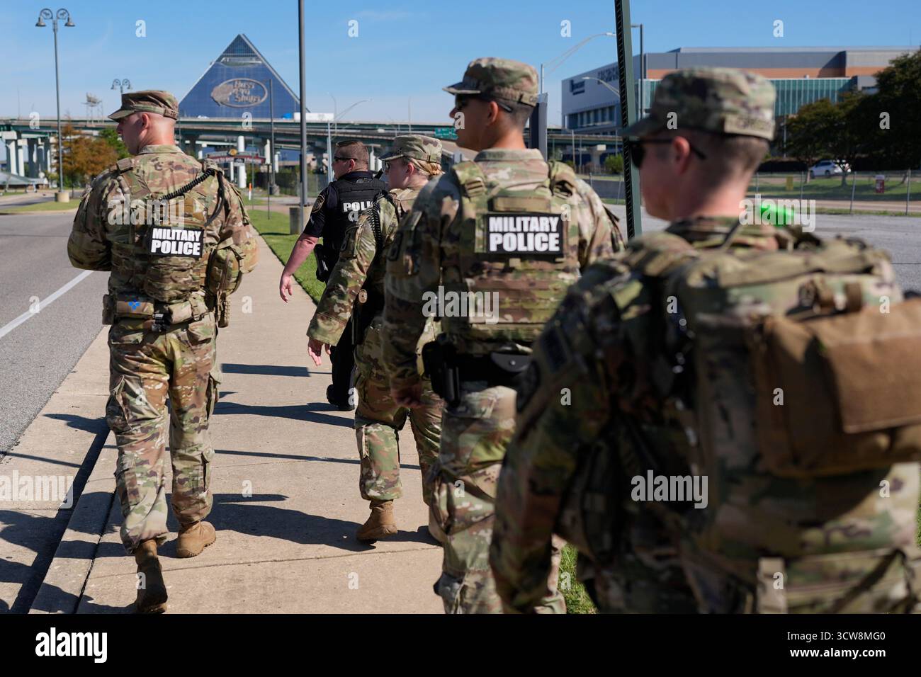 Members of the National Guard patrol along a street in Memphis, Tenn ...