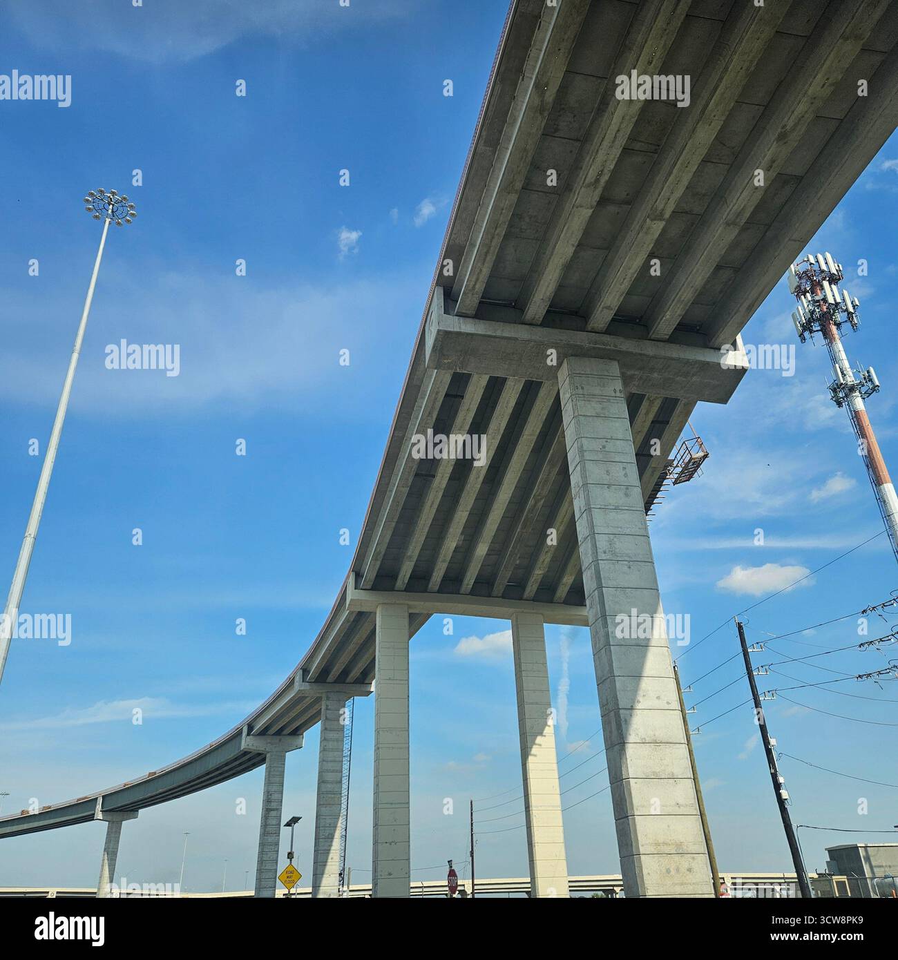 A high overpass curving to the left on a highway in Houston, viewed ...